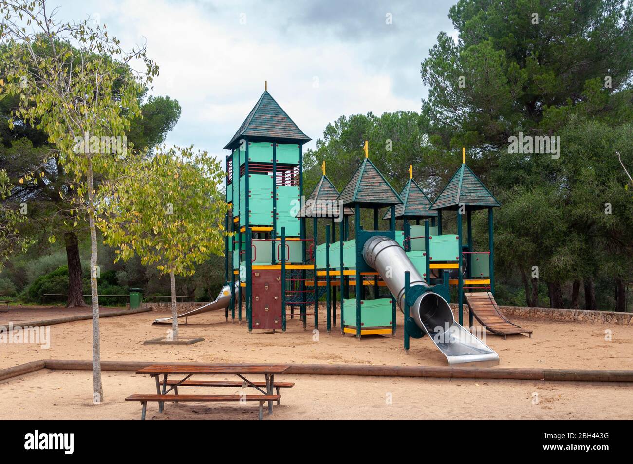 Playground in the middle of an abandoned forest, spain Stock Photo - Alamy