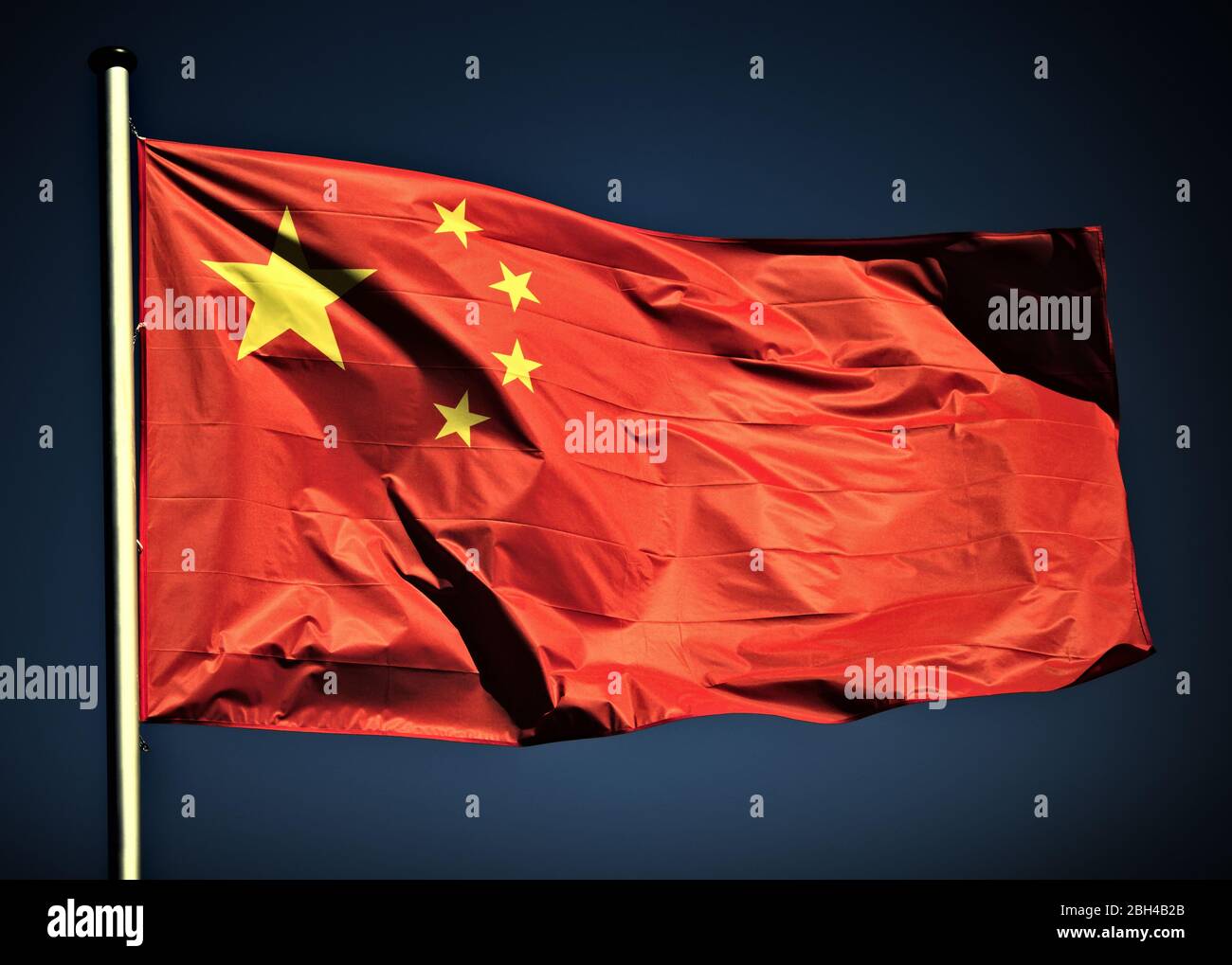 Chinese china national flag blowing in the wind Stock Photo - Alamy