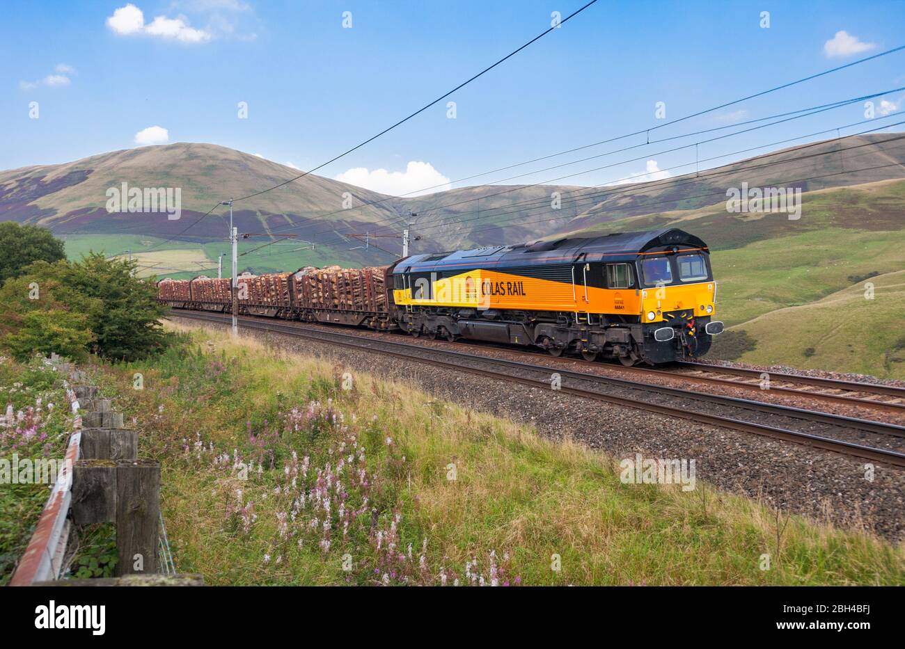 Colas rail Freight class 66 locomotive 66841 passing Dillicar Common ...