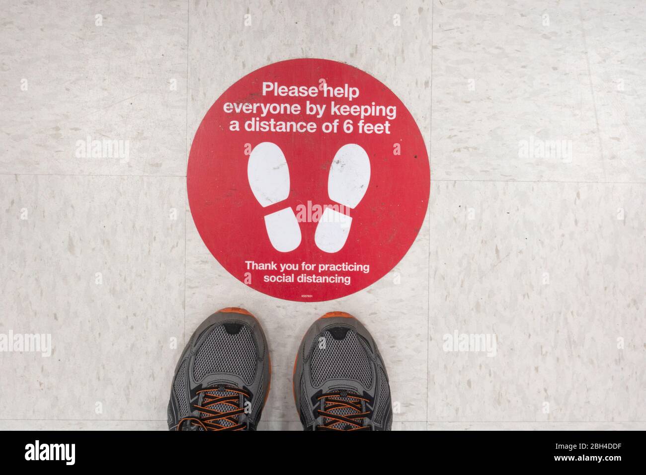 Social distancing at Target Store with a foot print marker every six ...
