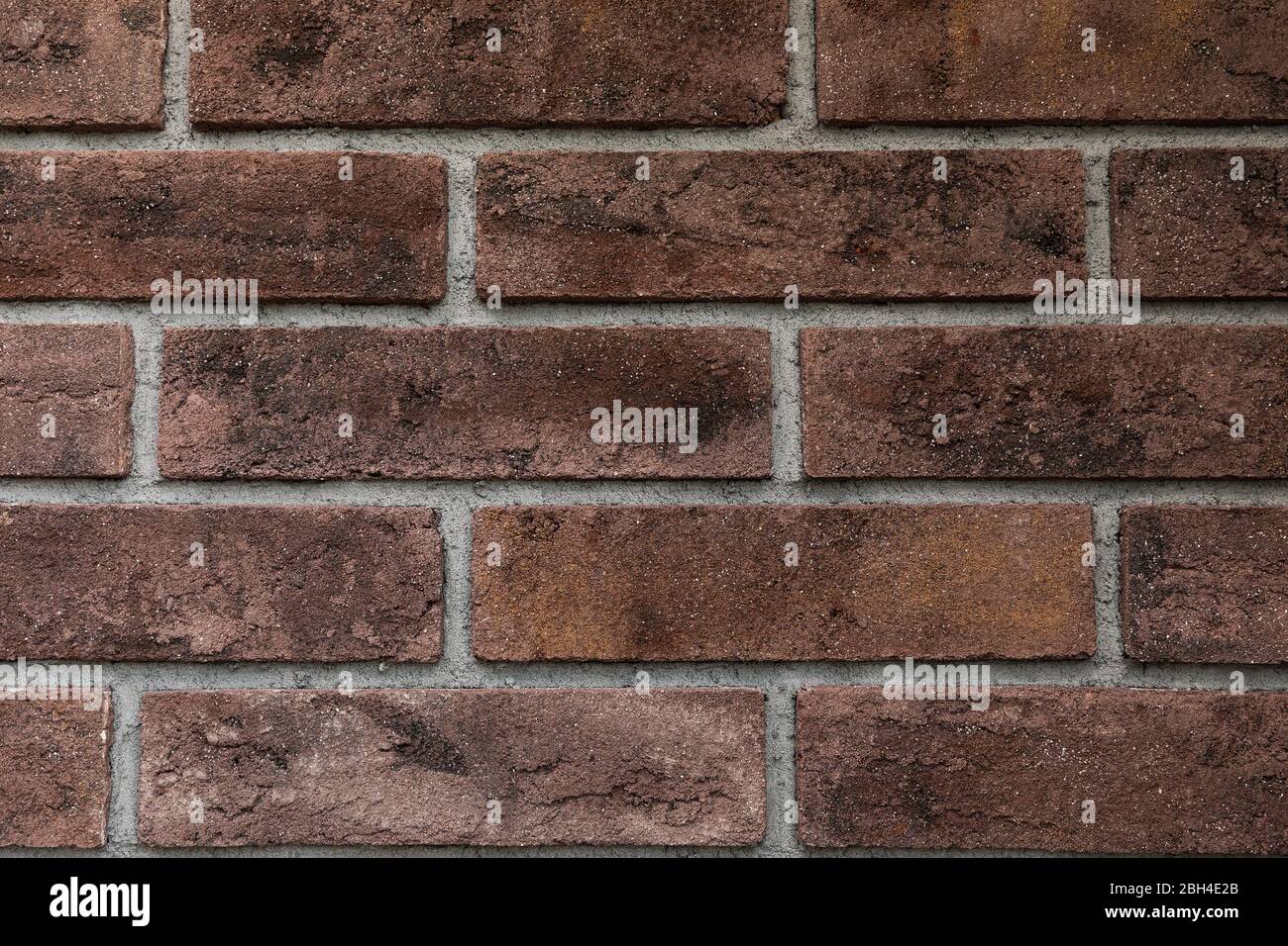 Modern brick wall texture background Stock Photo - Alamy