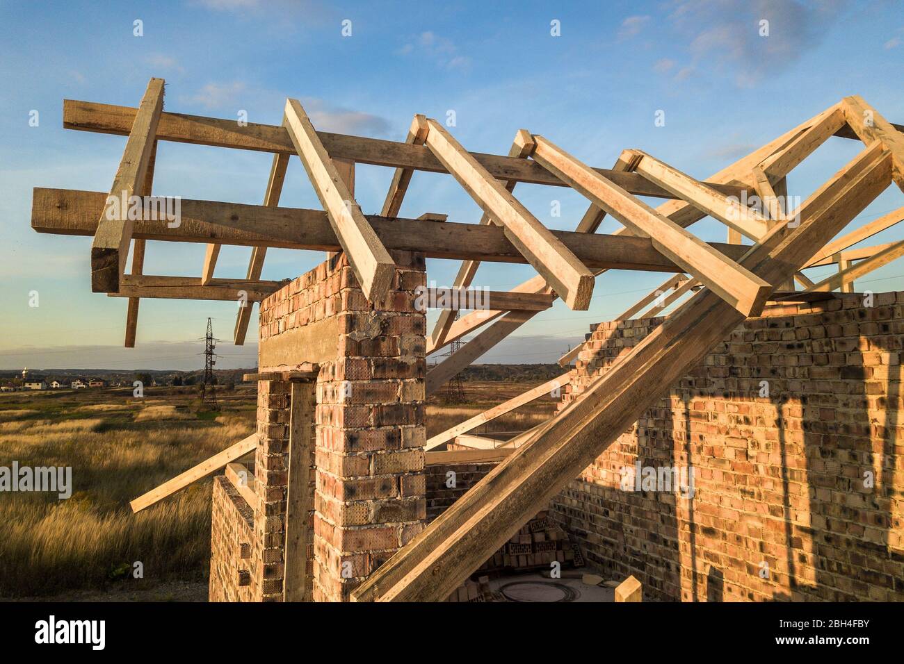 Private residential house with wooden roof frame structure under ...