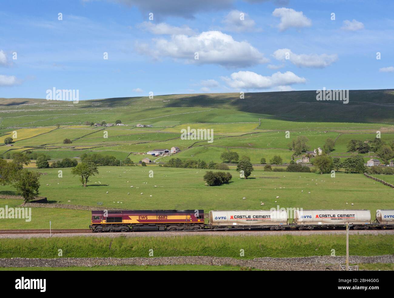 DB Cargo / EWS class 66 locomotive hauling a bulk freight train at ...