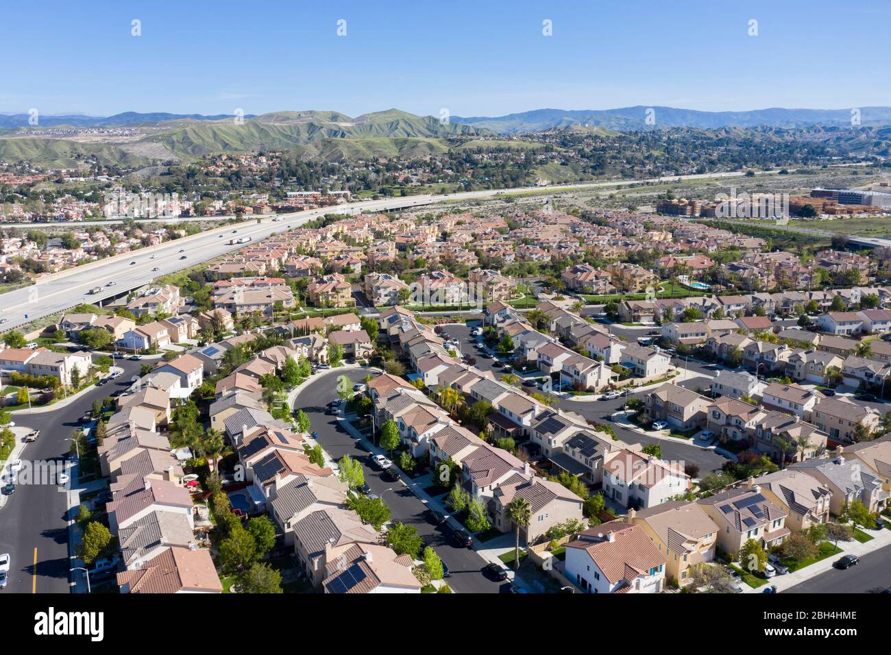 Aerial view above Canyon Country sprawl rows of homes north of Los ...