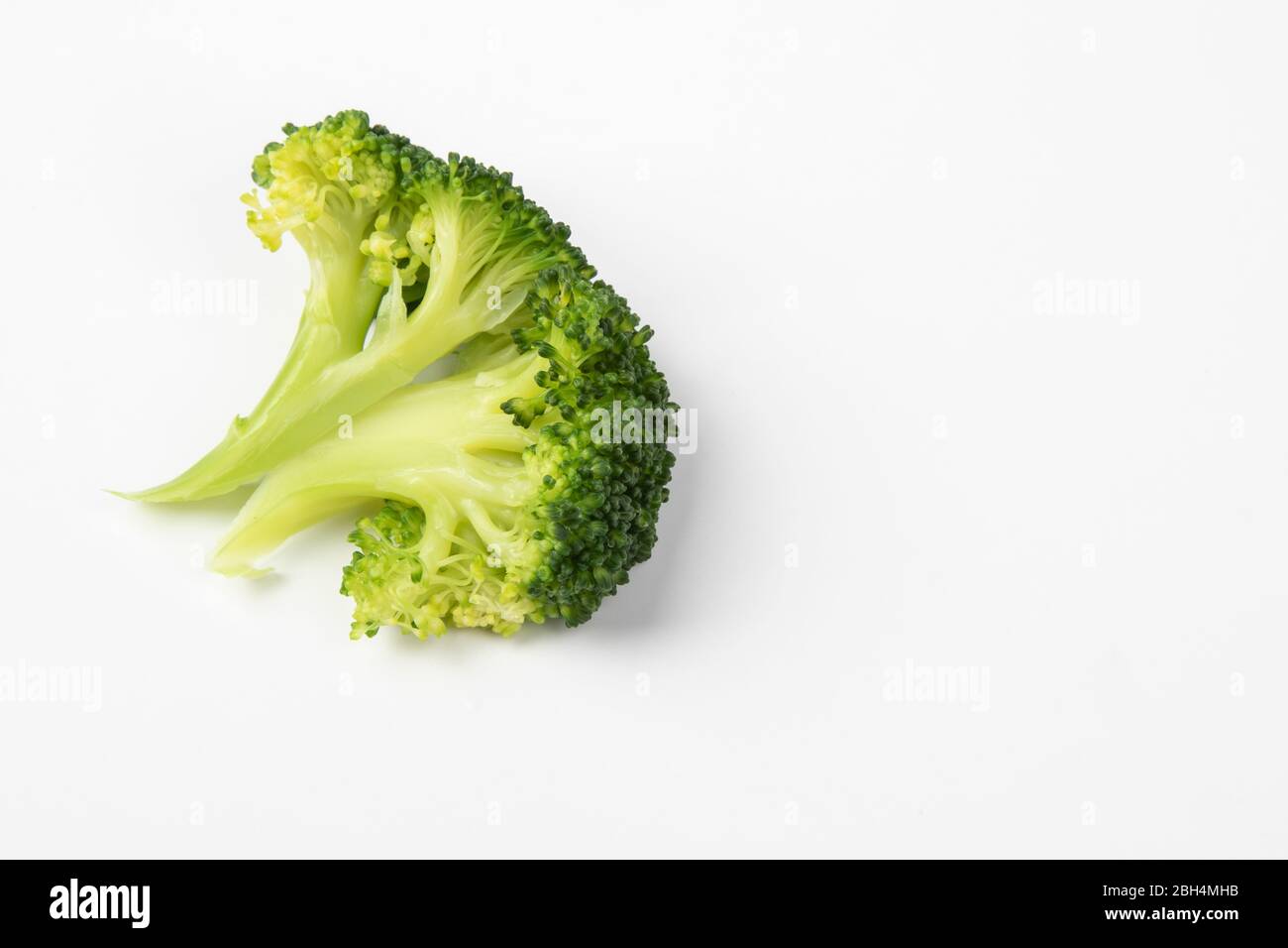 Cooked fresh broccoli isolated on white background Stock Photo - Alamy