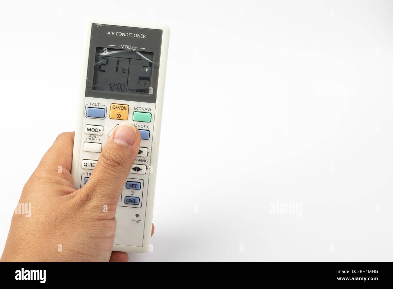 Man hand air conditioner Remote control on White background Stock Photo ...