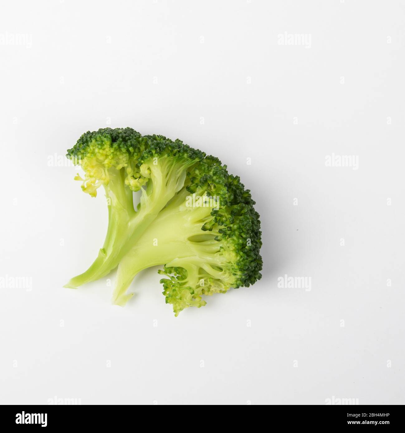 Cooked fresh broccoli isolated on white background Stock Photo - Alamy