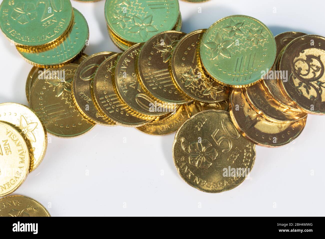 Close-up Malaysian ringgit coins with white background Stock Photo - Alamy