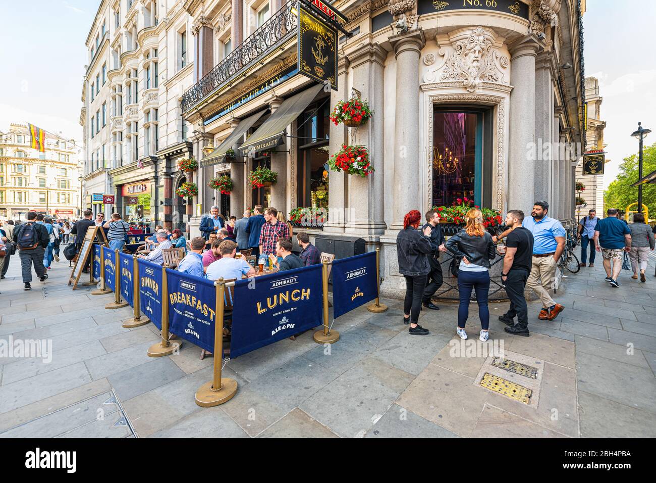 London, UK - June 21, 2018: Road street and restaurant near Trafalgar ...