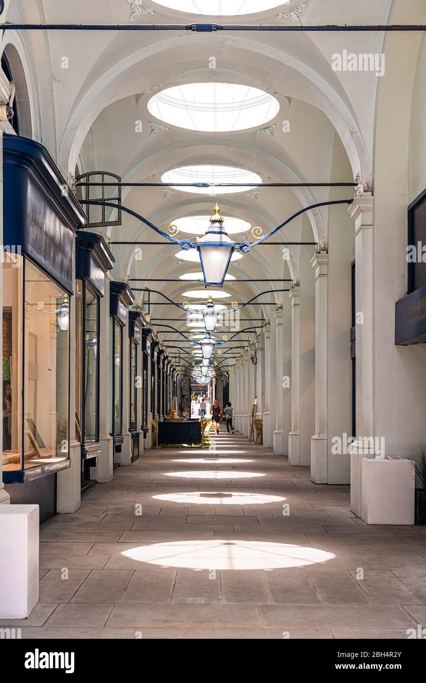 London, UK - June 22, 2018: Empty shopping passage tunnel with man ...