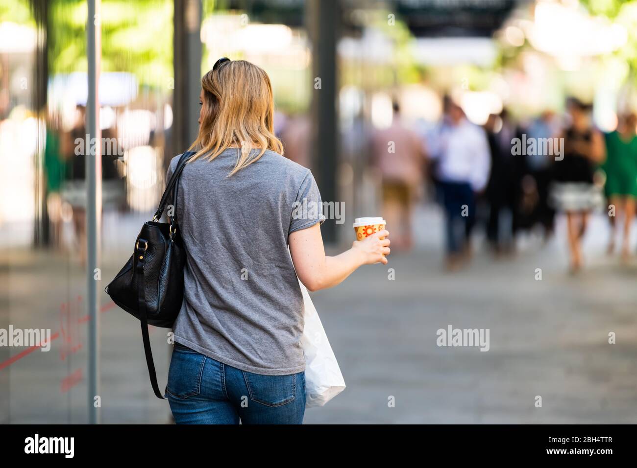Walking with coffee cup hi-res stock photography and images - Alamy