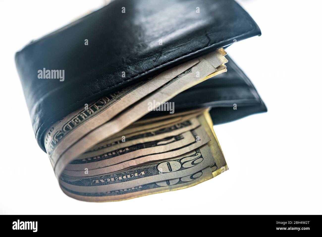 Money in wallet Stock Photo - Alamy