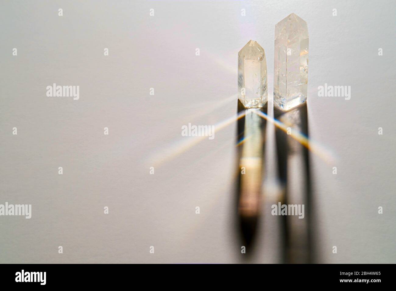 Quartz crystals on white background Stock Photo - Alamy