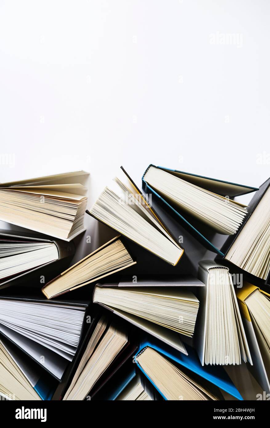 Books viewed from directly above Stock Photo - Alamy