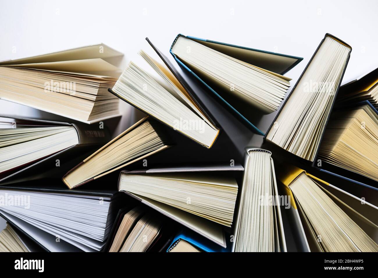 Books viewed from directly above Stock Photo - Alamy