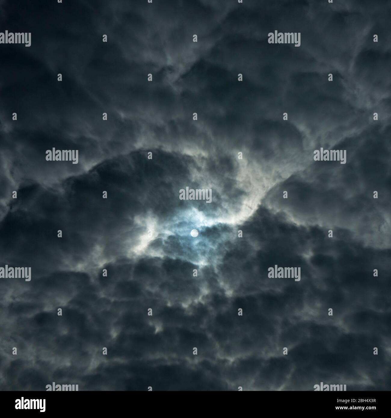 Full moon in dramatic night sky Stock Photo - Alamy