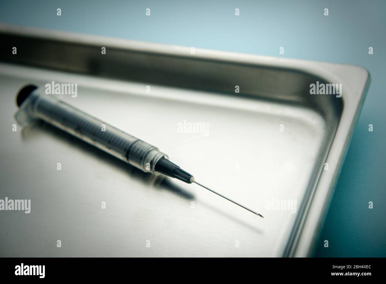 Needle on tray Stock Photo - Alamy