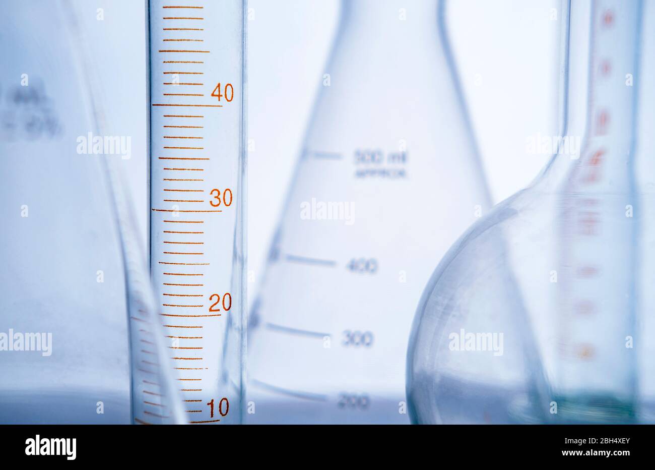 Measurements on beakers Stock Photo - Alamy