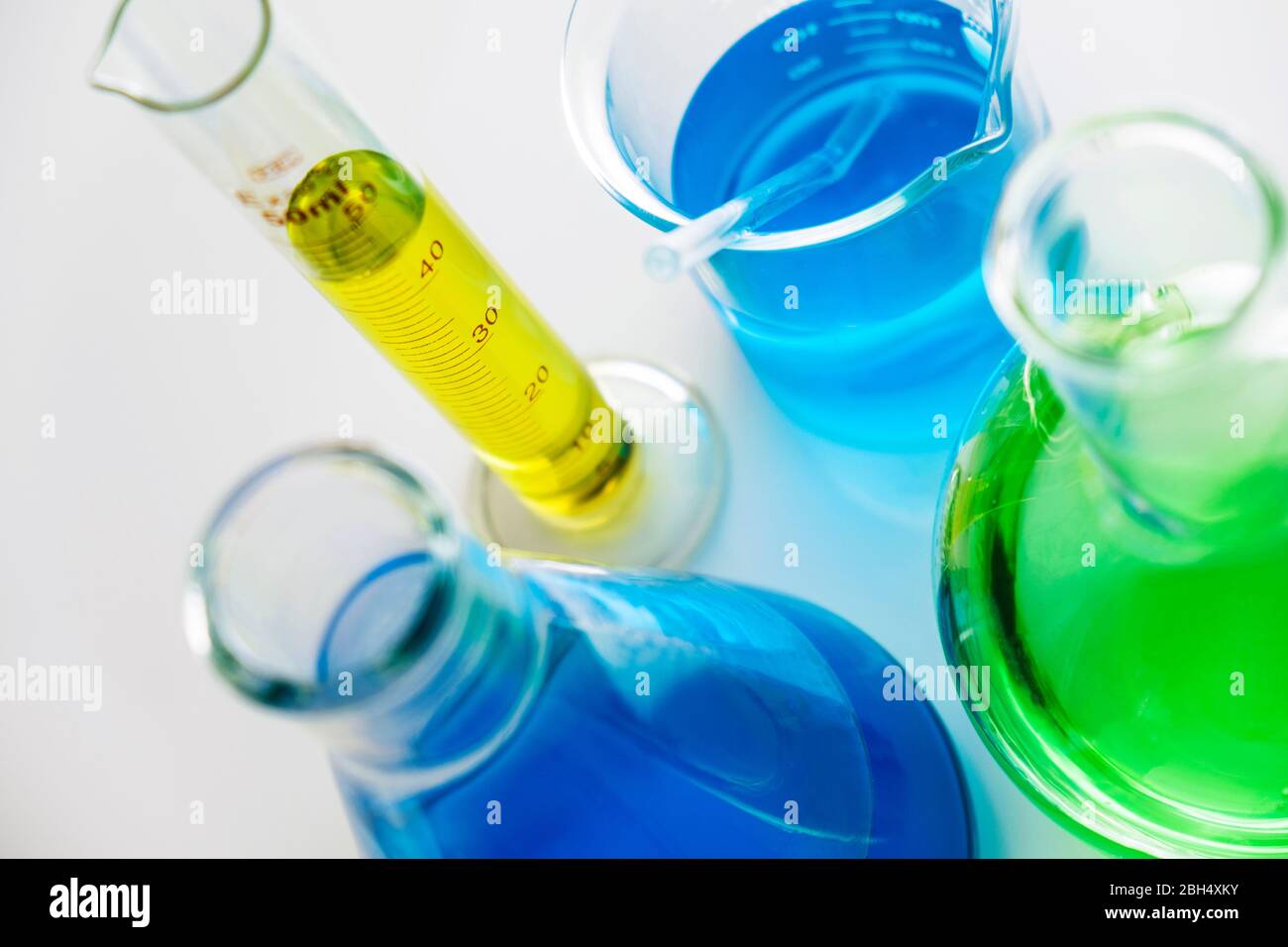 Colorful liquid in beakers Stock Photo - Alamy