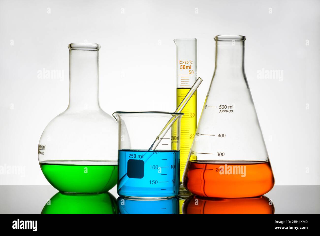 Colorful liquid in beakers Stock Photo - Alamy