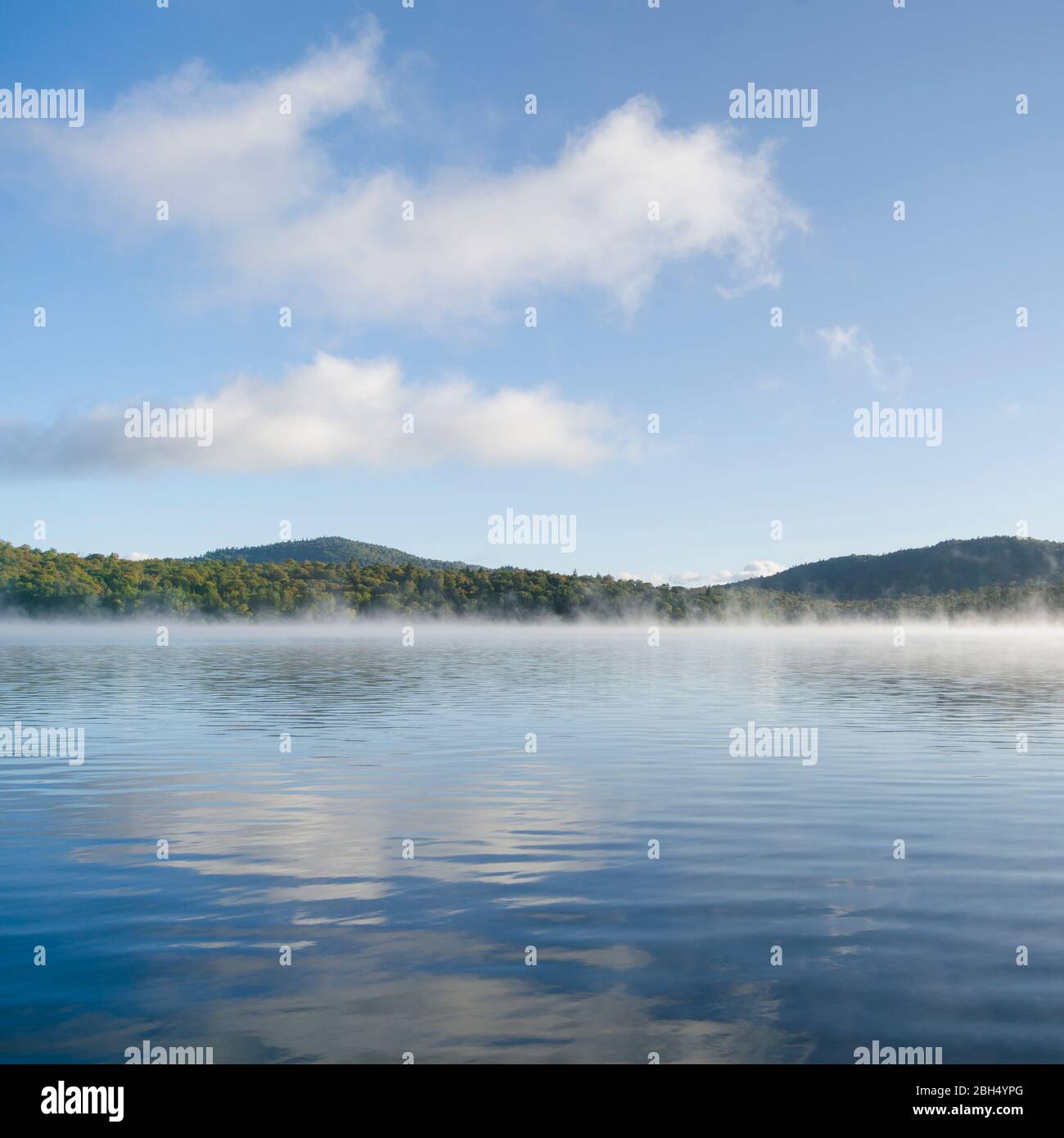 Lake in fog Stock Photo - Alamy