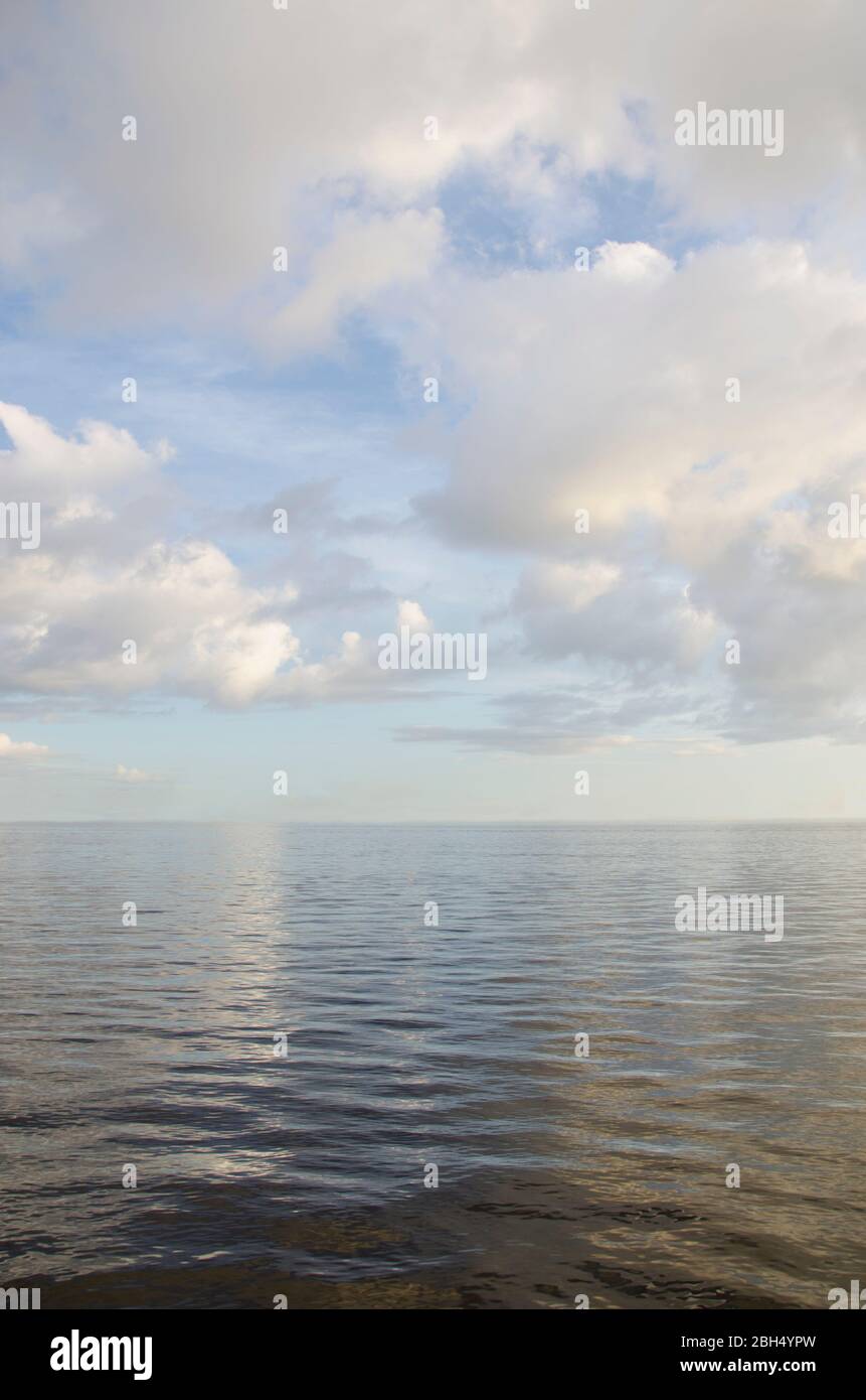 Sea under cloud Stock Photo - Alamy