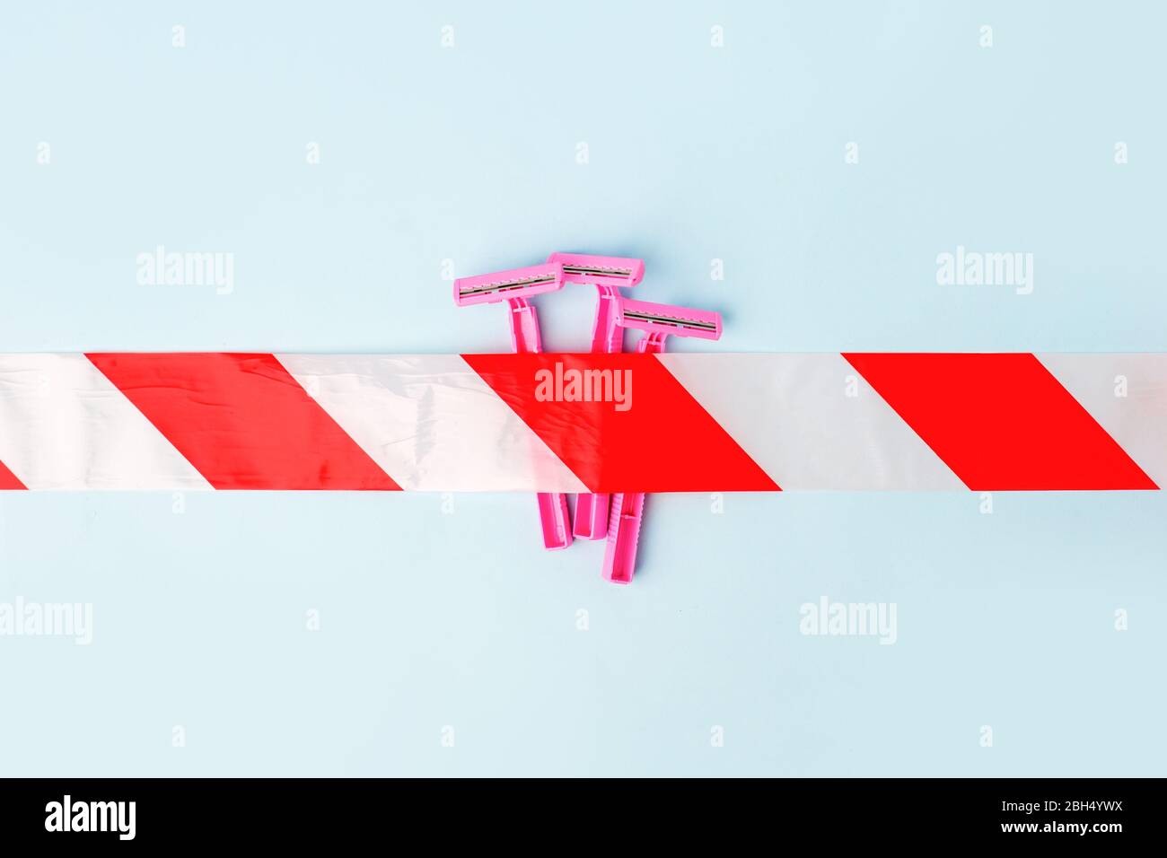 Shaving razors and stop sign on pink background, concept of skincare ...