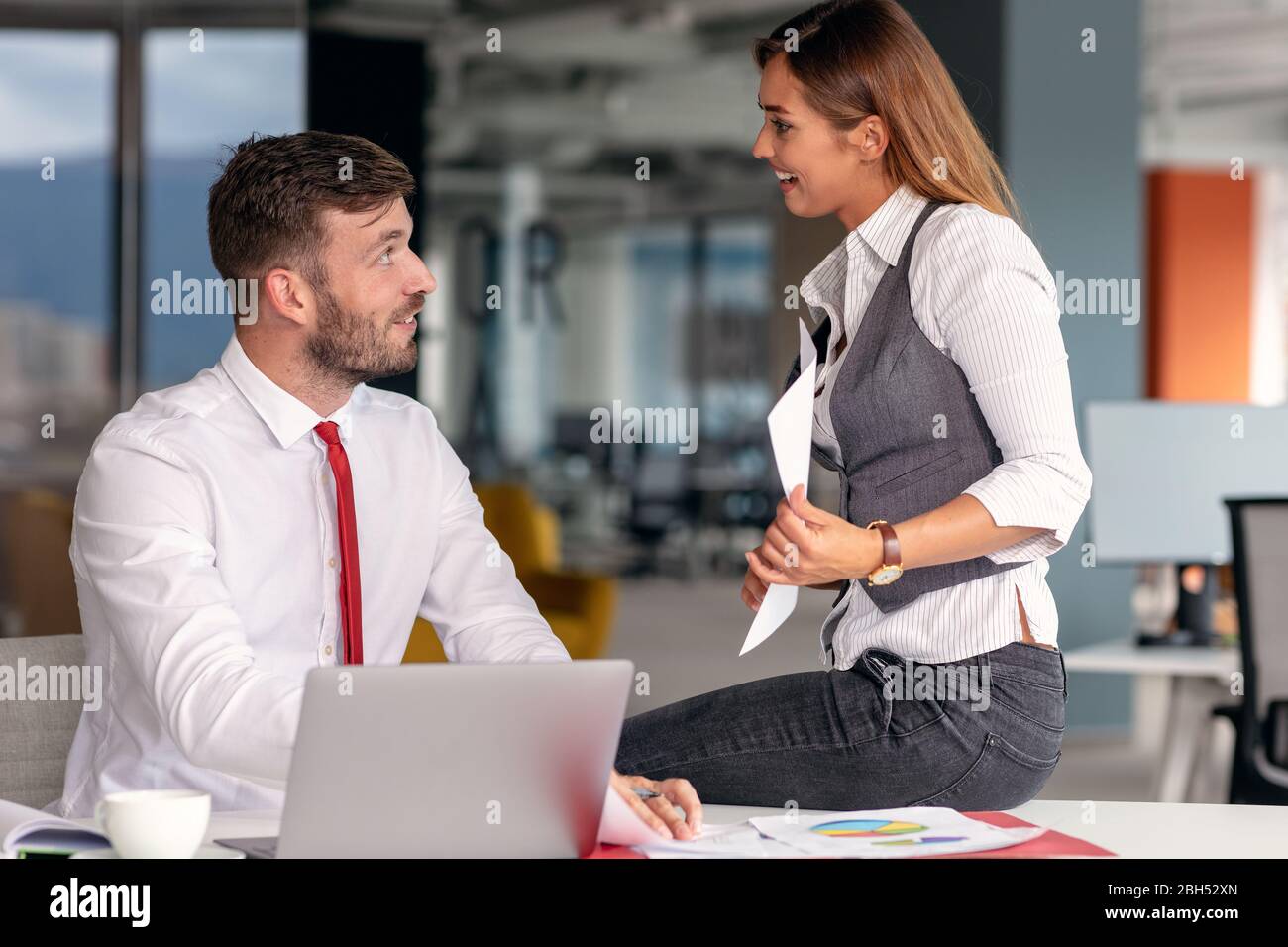 Young Business people working together on computer Stock Photo - Alamy