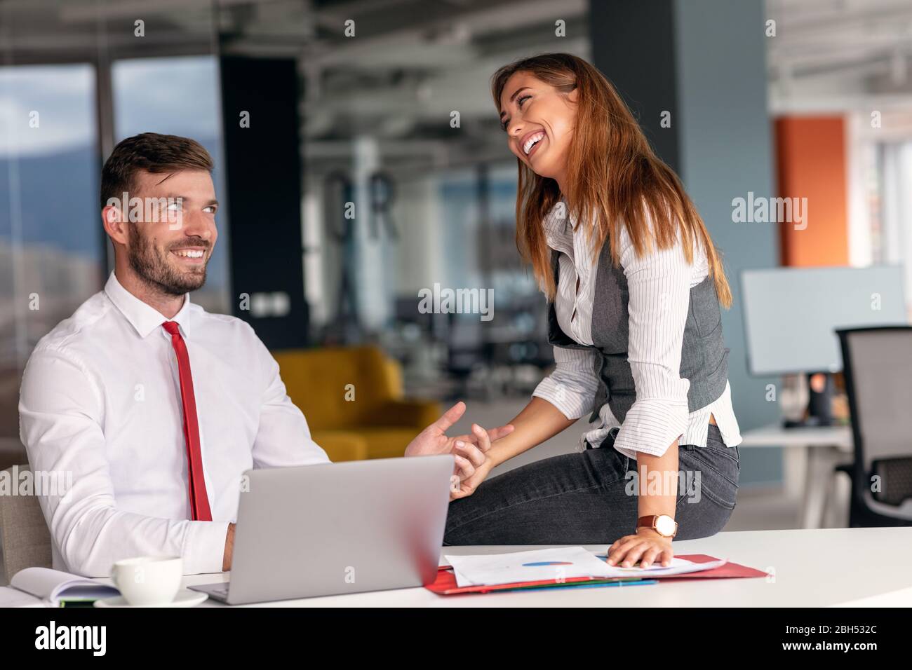 Young Business people working together on computer Stock Photo - Alamy