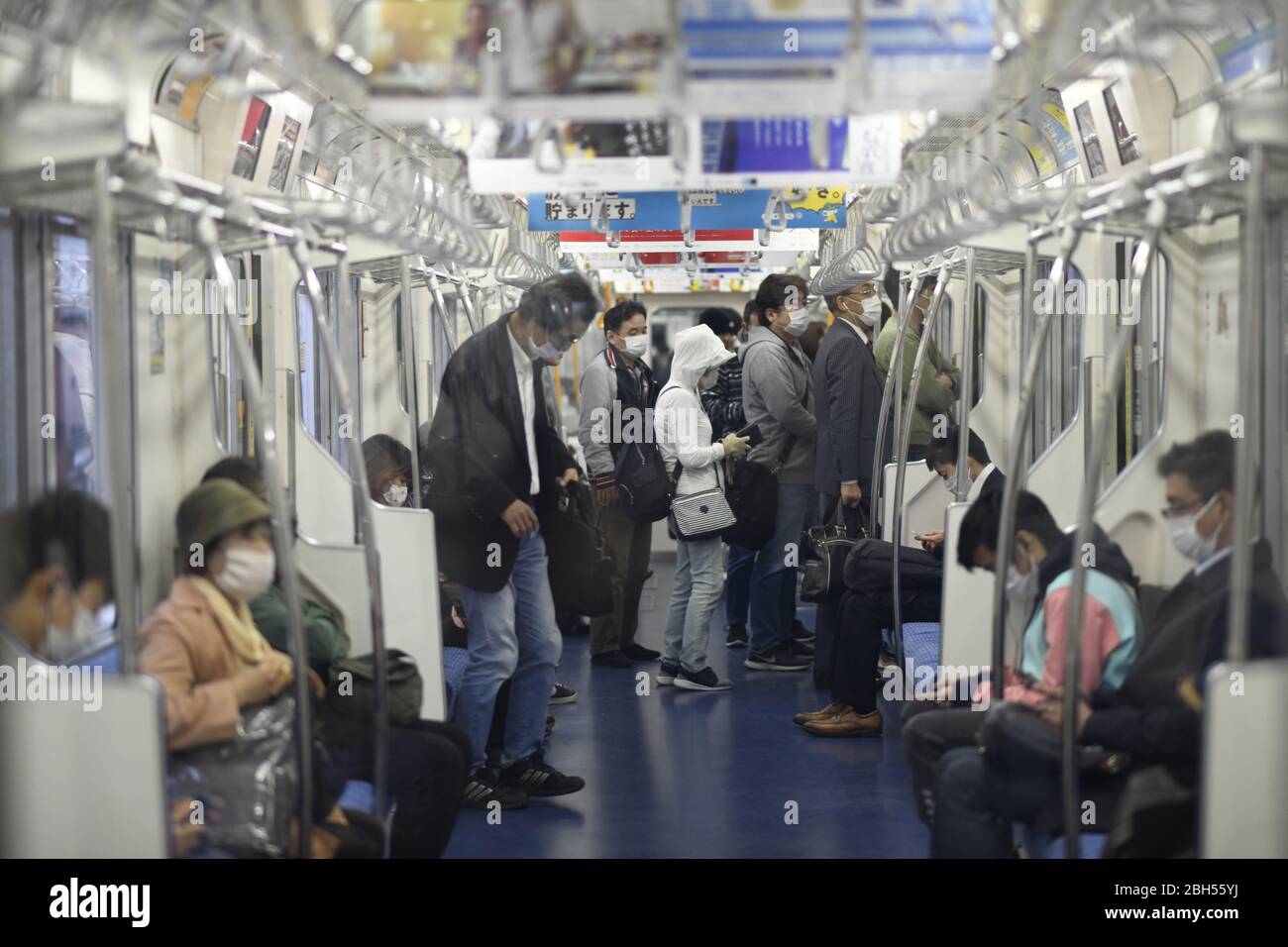 Wednesday. 22nd Apr, 2020. TOKYO, JAPAN - APRIL 22: Commuters with face ...