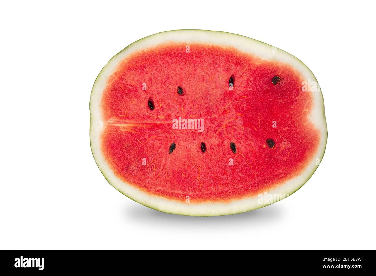 Cut lengthwise a half of organic watermelon on white isolated ...