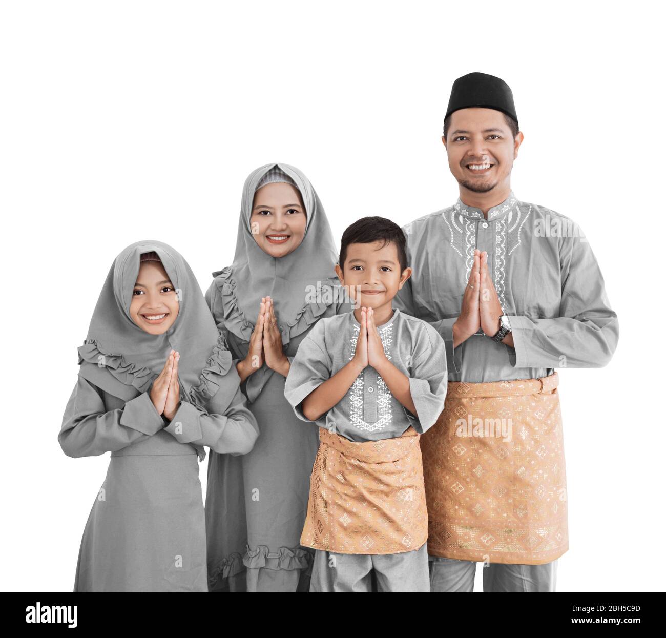 Asian family muslim with two children isolated over white background ...