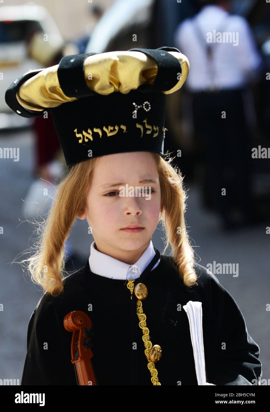 Hasidic boys wearing costumes for the Purim festival in the Mea Shearim ...