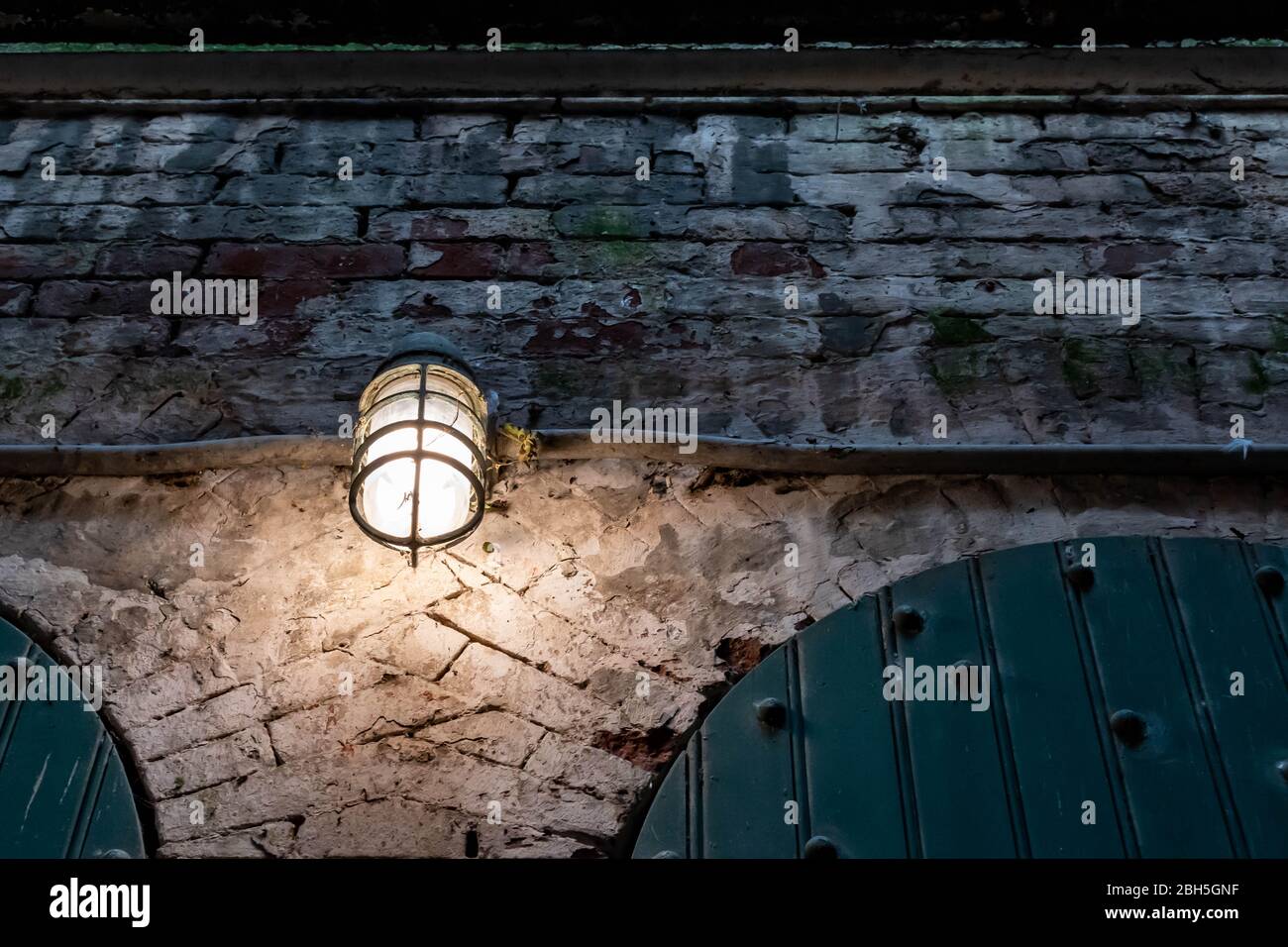 Vintage light on old brick wall good for backdrop and vintage ...