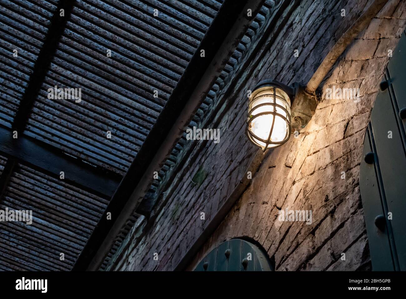 Vintage light on old brick wall good for backdrop and vintage ...