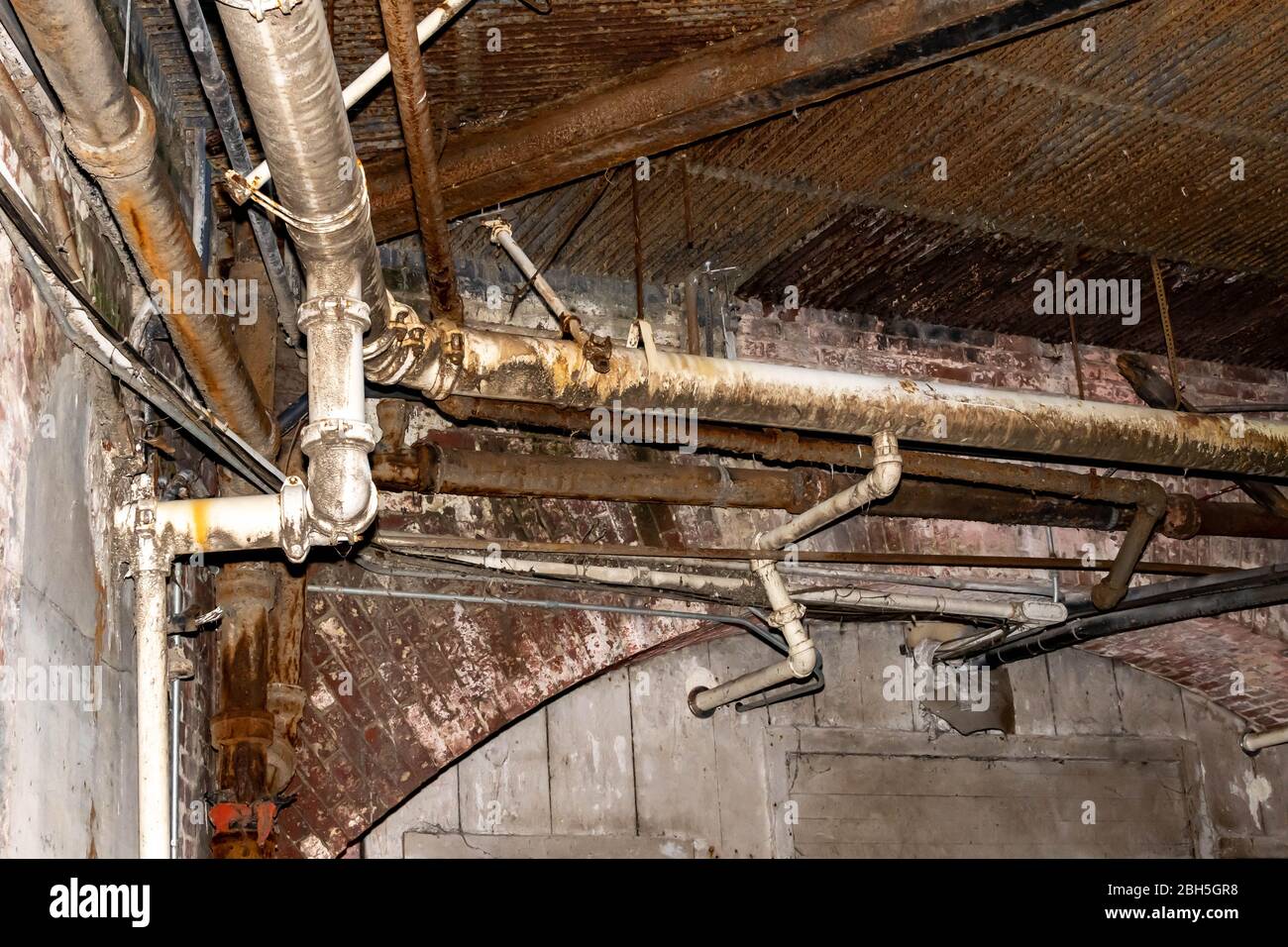 Rusty old sewage or water pipe for Piping repair or pipe installation ...