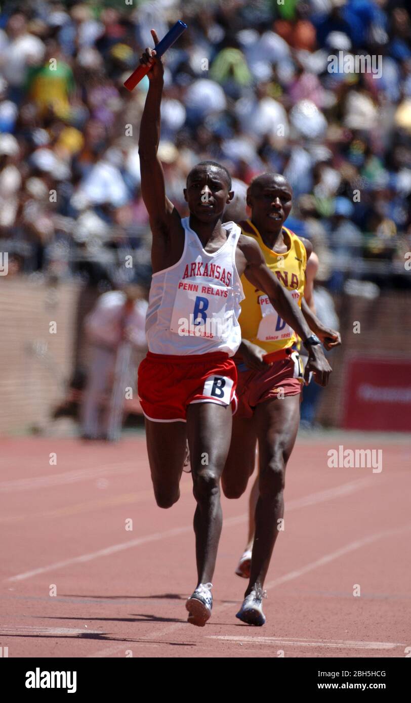 Josphat Boit of Arkansas celebrates after overtaking Richard Kiplagat ...