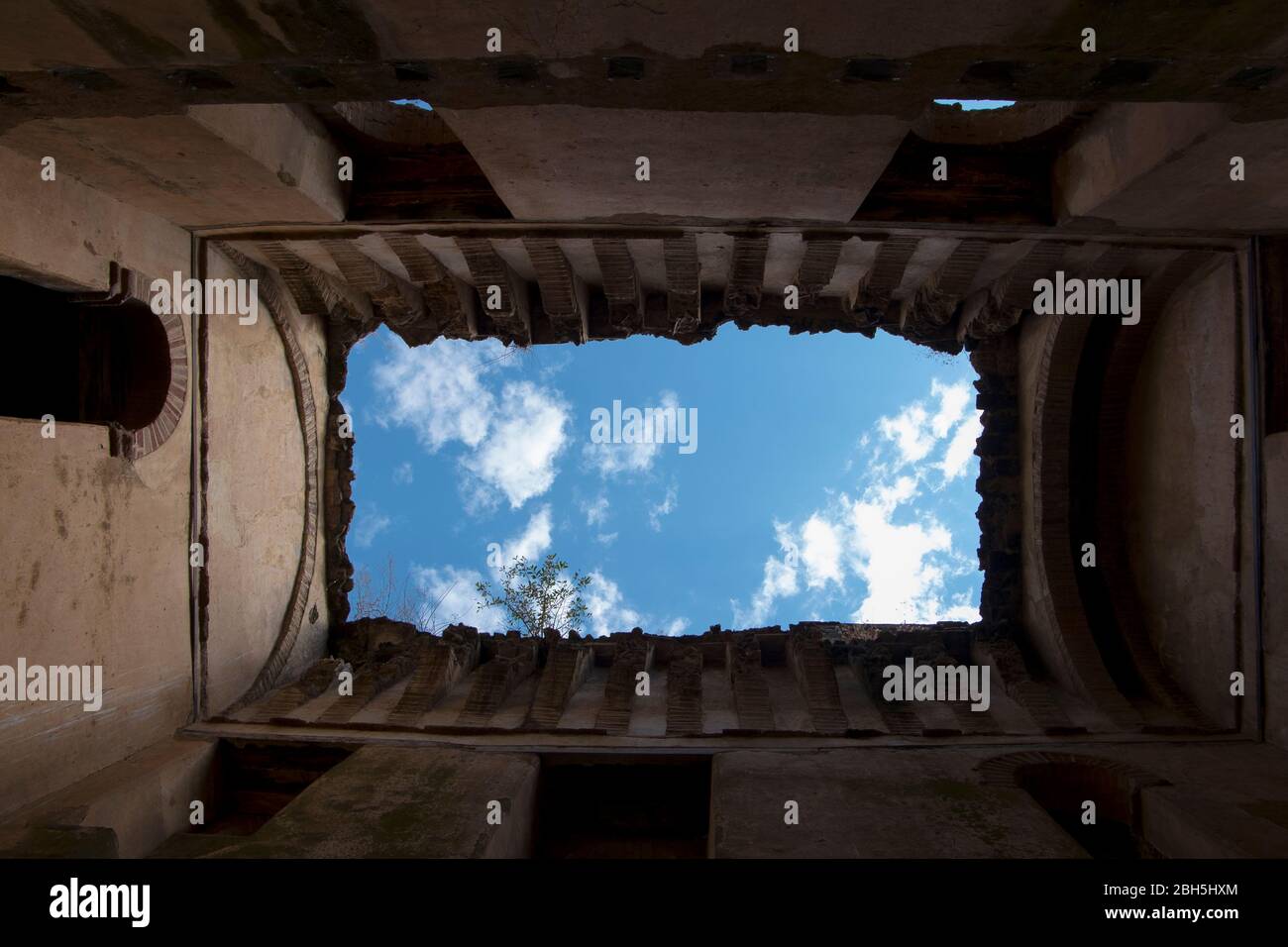 Looking upward to the ope sky from the collapsed roof of the Iyasu I ...