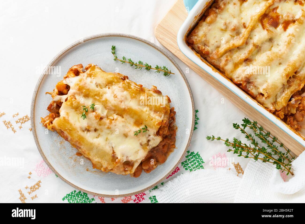 Cannelloni pasta with filling of ground beef, tomatoes, baked with ...