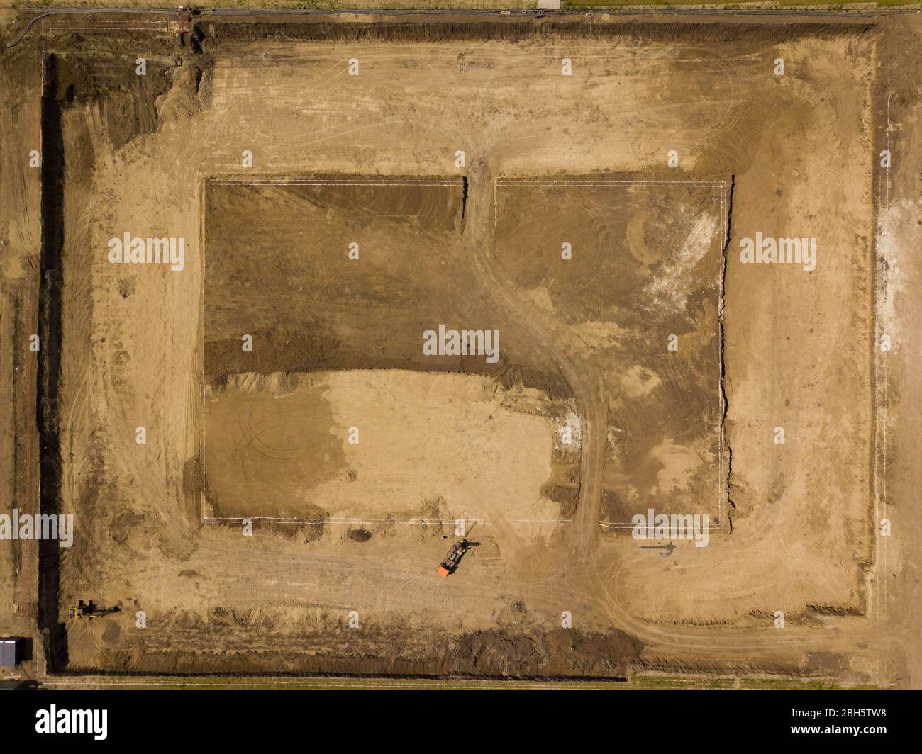 The foundation pit for the building in the courtyard of a high-rise ...