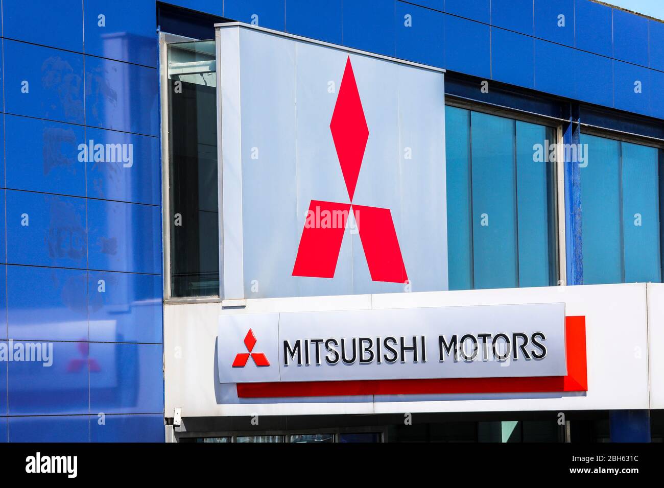 Logo sign for Mitsubishi motors, outside a vehicle outlet, Ayr Stock ...