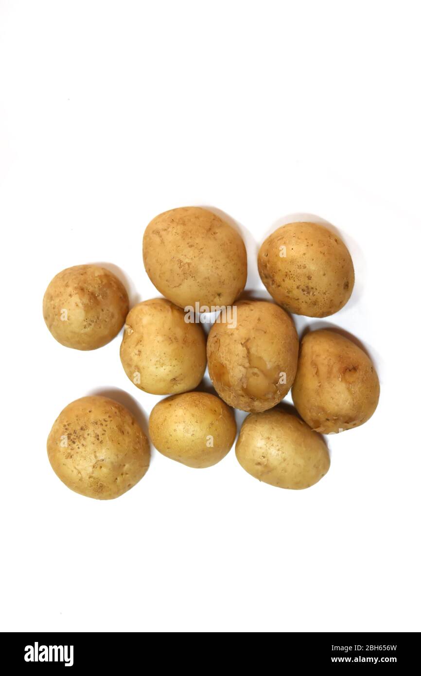 new potato tuber isolated on white backgrounds Stock Photo - Alamy