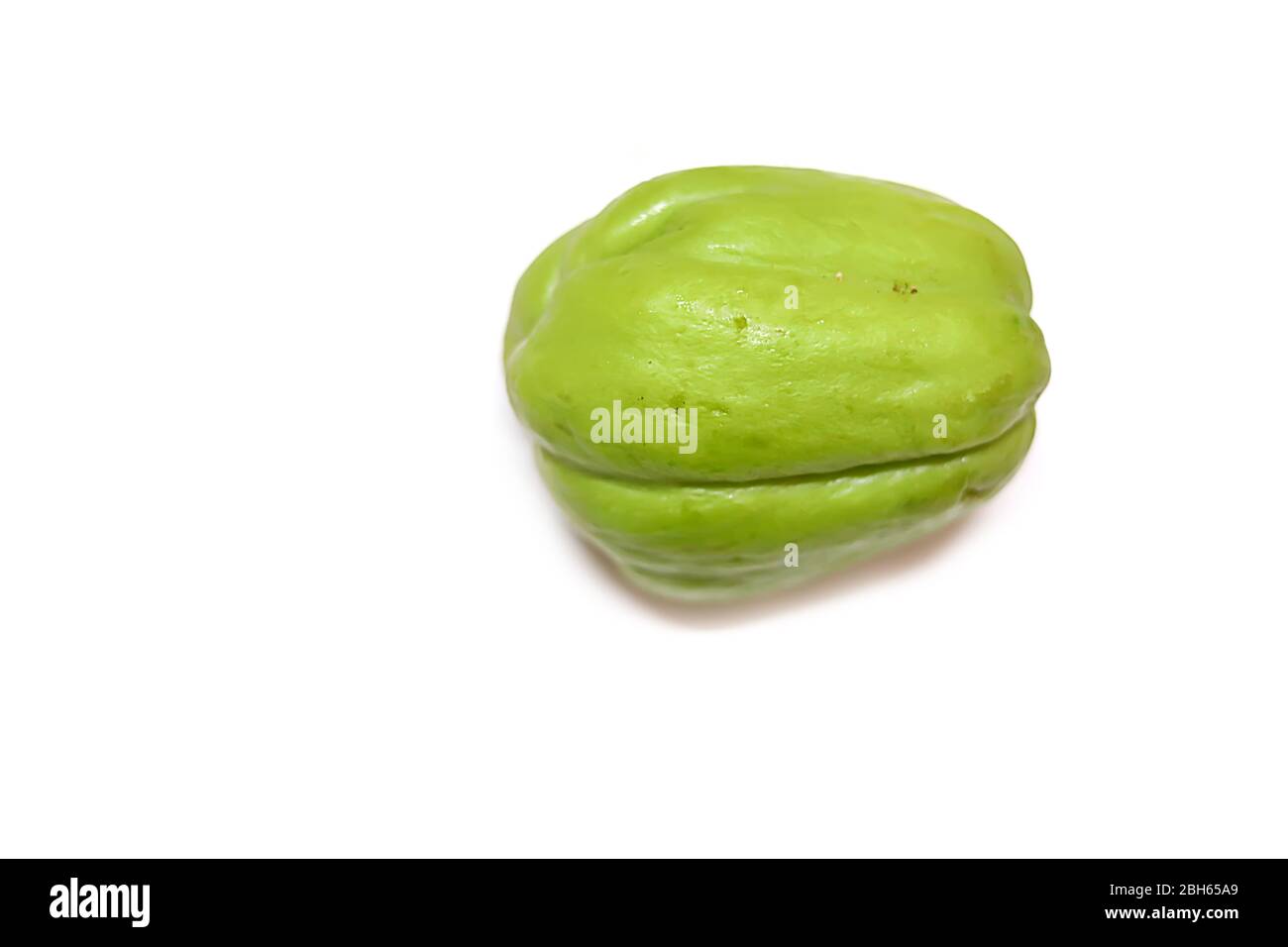 Chayote delicious green vegetable, lying, on white backgrounds Stock ...