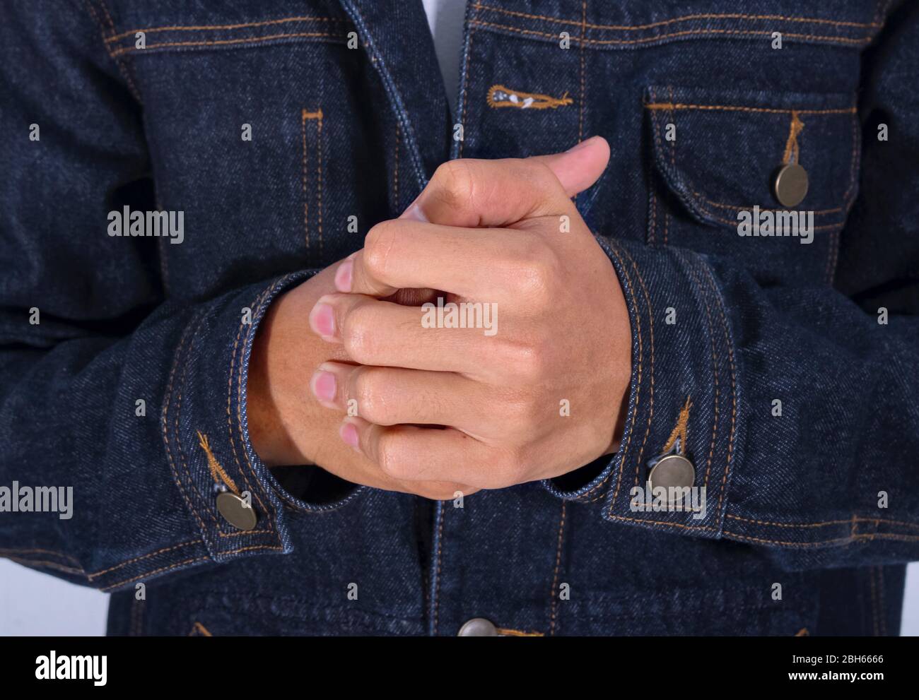 A Photo of a boy is wisping his hands Stock Photo - Alamy