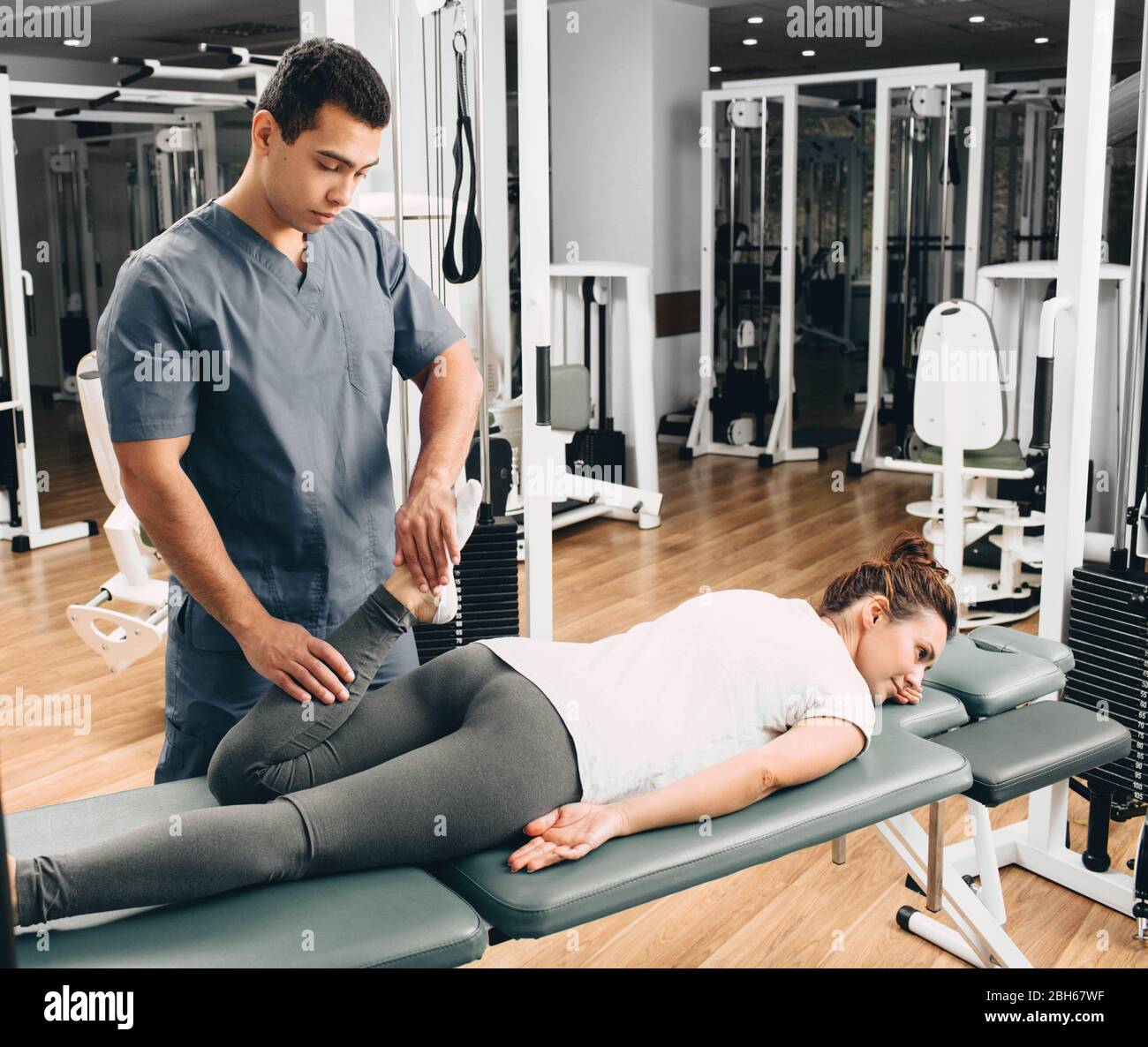 Woman doing leg exercises hi-res stock photography and images - Alamy