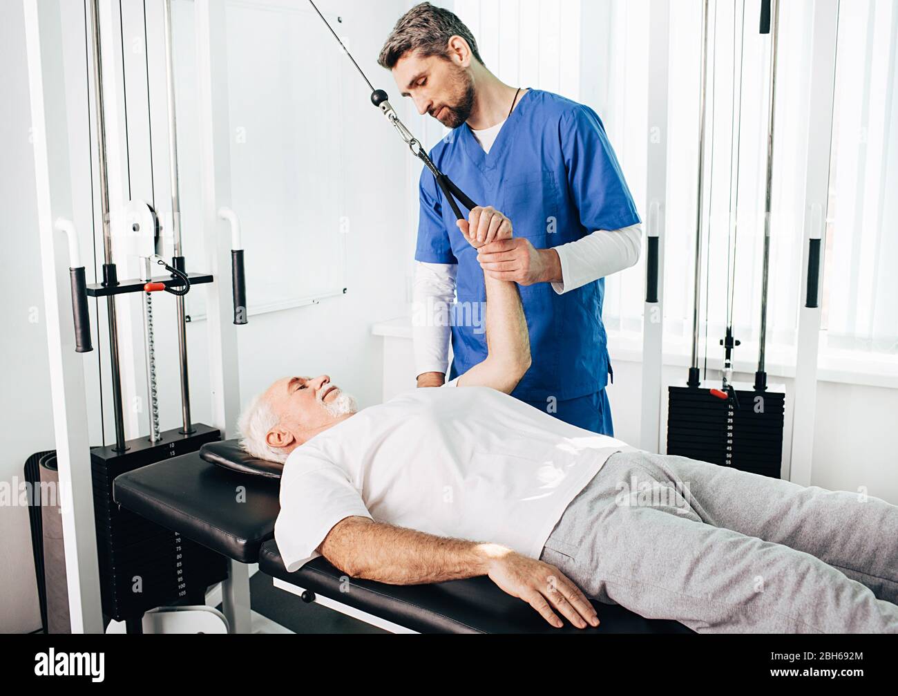 treatment of pain in the shoulder joint with kinesitherapy. recovery ...