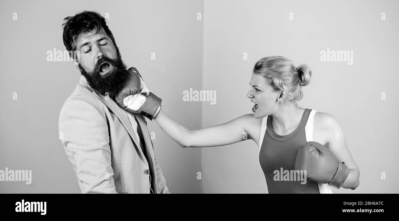 Gender equal rights. Couple in love competing in boxing. Conflict ...