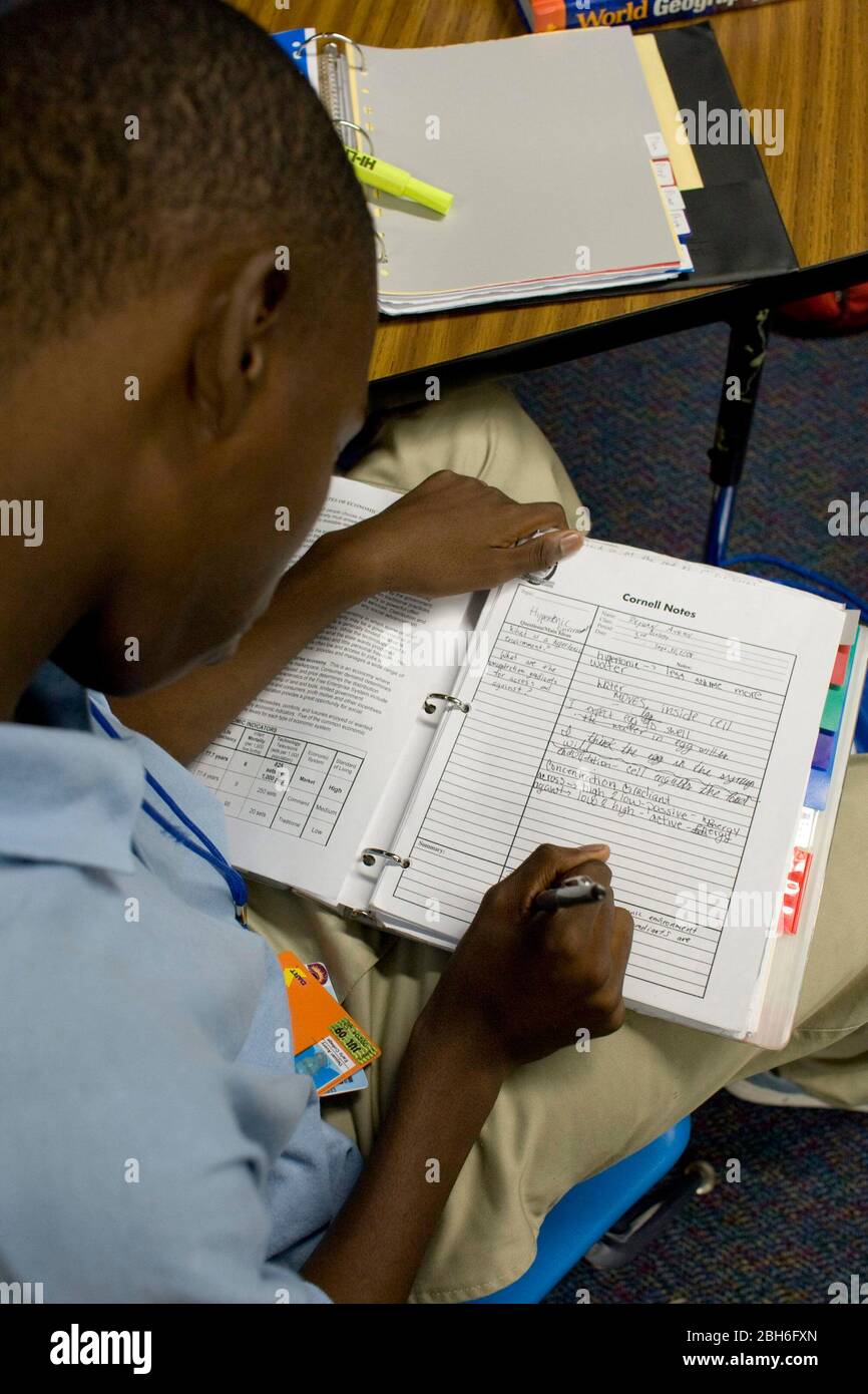 Early teen students in uniform hi-res stock photography and images - Alamy