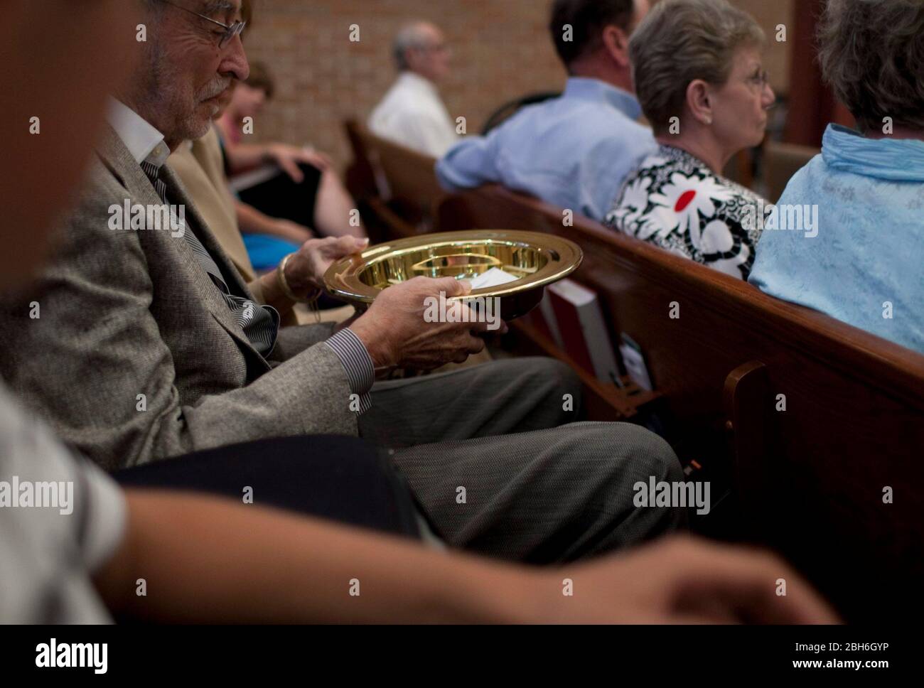 Offertory tithing hi-res stock photography and images - Alamy
