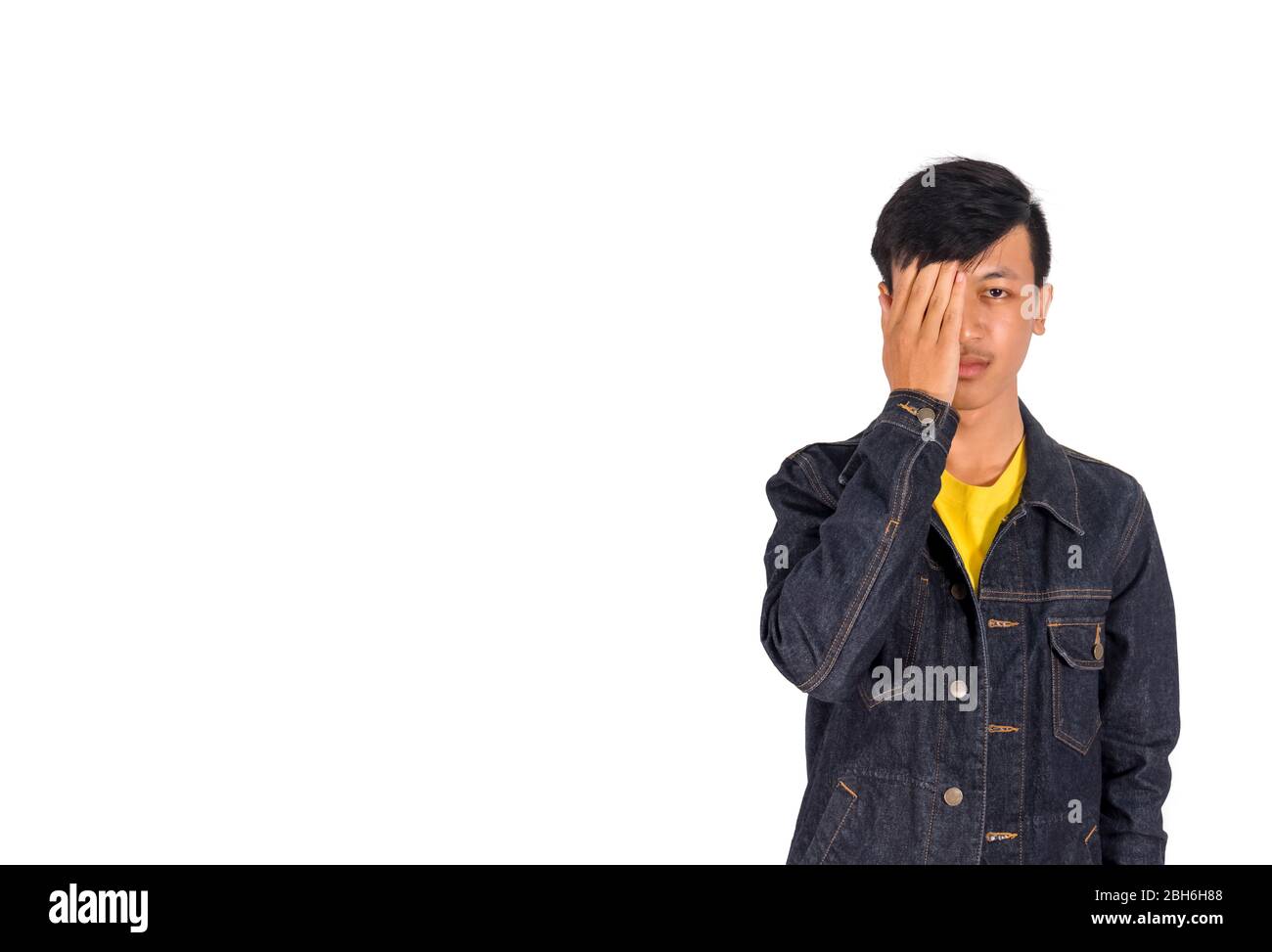 Handsome young man covering eyes hand portrait Cut Out Stock Images ...